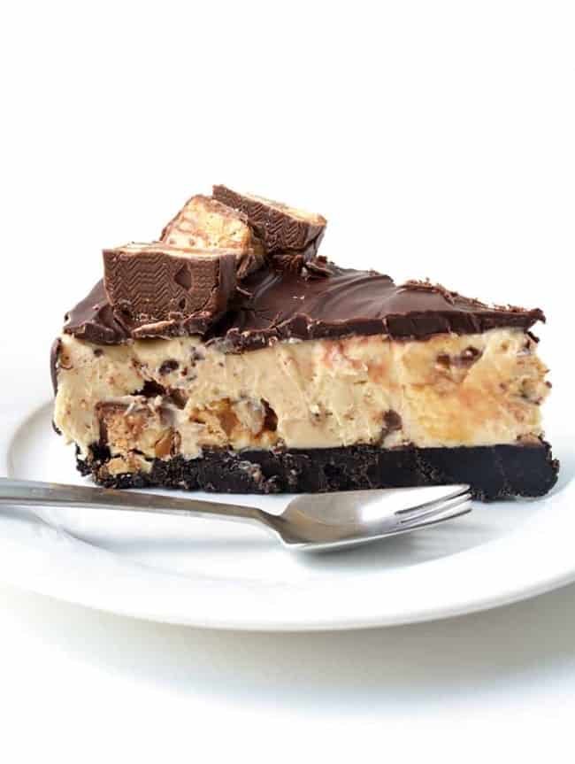 Peanut Butter Snickers Oreo Cheesecake - Sweetest Menu