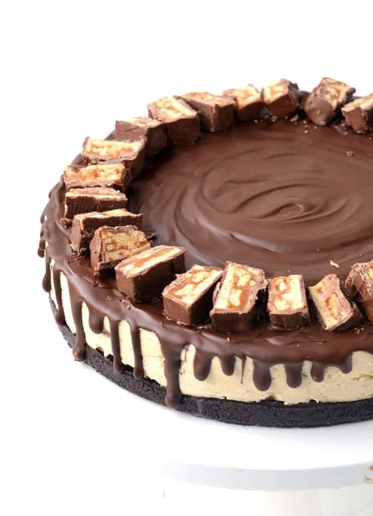 Peanut Butter Snickers Oreo Cheesecake - Sweetest Menu